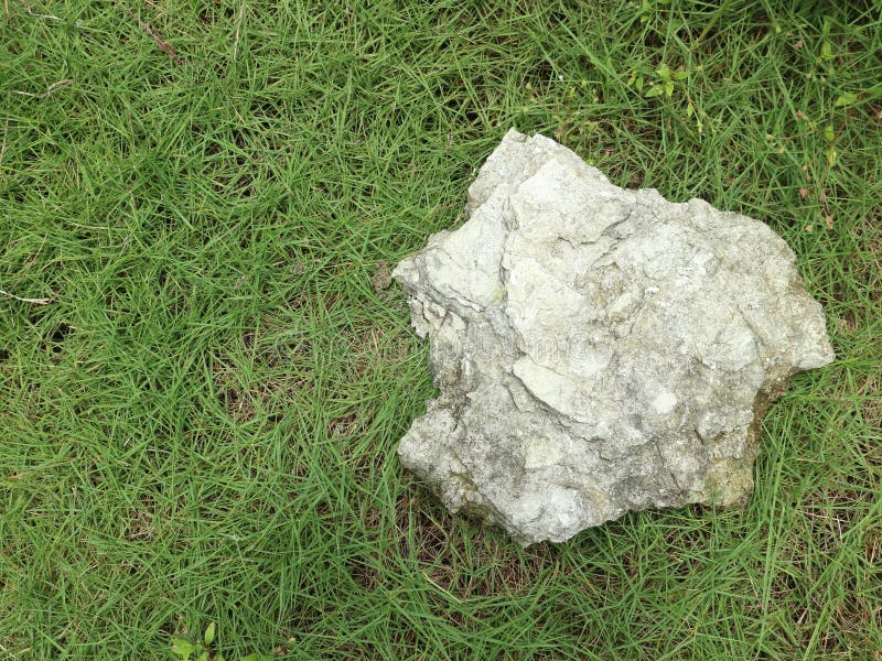 Background of Grass and a Piece of Mountain Rock Stock Image - Image of ...