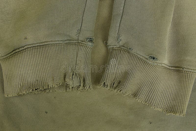 Texture of a Fabric from Old Torn Sleeves on Clothes Stock Image ...