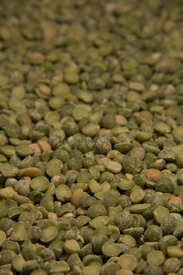 Background of Green Pea Groats. Close Up. Vertical. Stock Image - Image ...