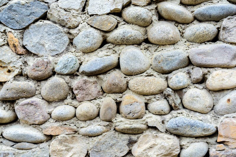 Background of Grey and Brown Stonework Wall with Different Forms Stones ...