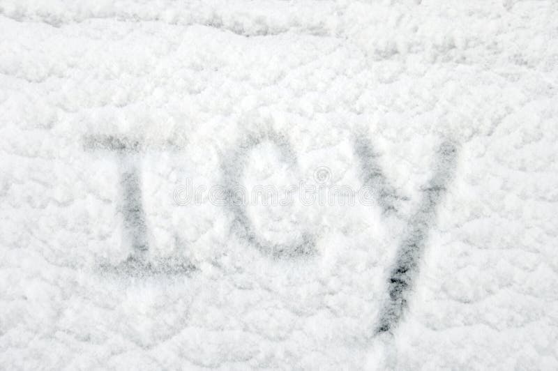 Icy written in white snow stock image. Image of white - 20368179