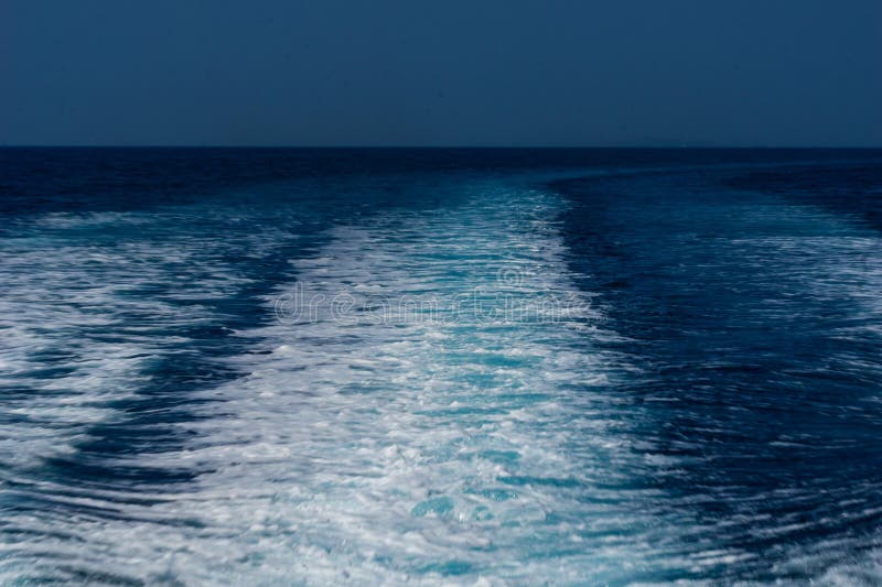Boat Trail on Water Near Shore Stock Photo - Image of ocean, wave: 92517314