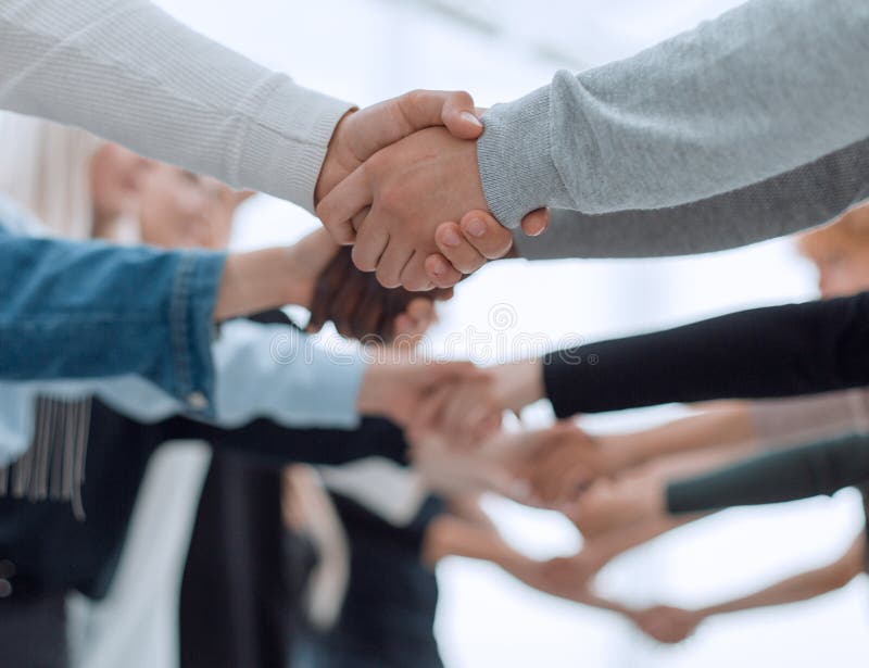 Background Image of Diverse Young People Shaking Hands Stock Photo ...