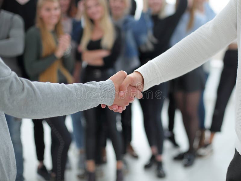 Background Image of Diverse Young People Shaking Hands Stock Photo ...