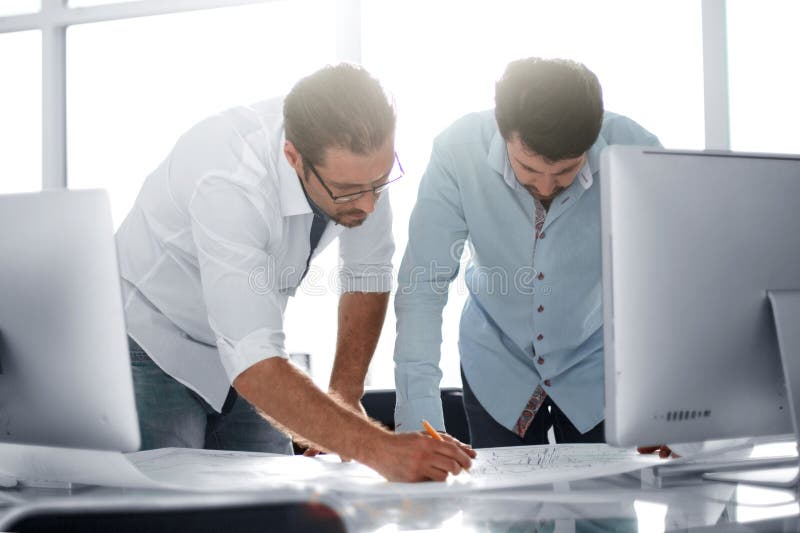 Engineer and Architect Look at the Sketches of the Project Stock Photo ...