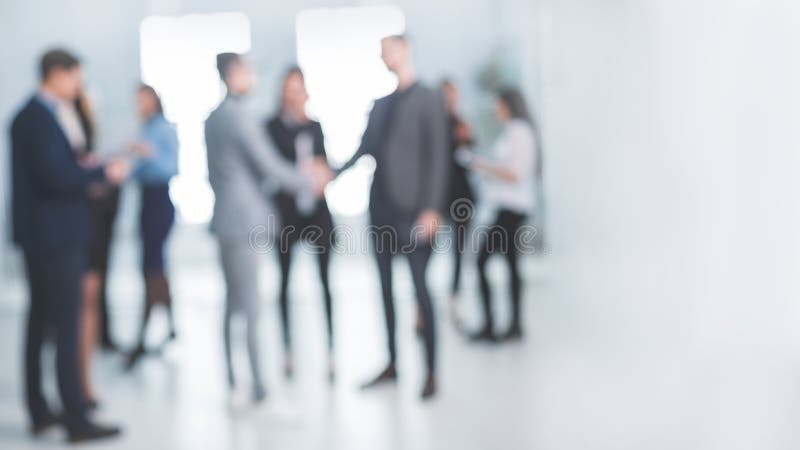 Background Image of a Group of Corporate Employees in the Office Lobby ...