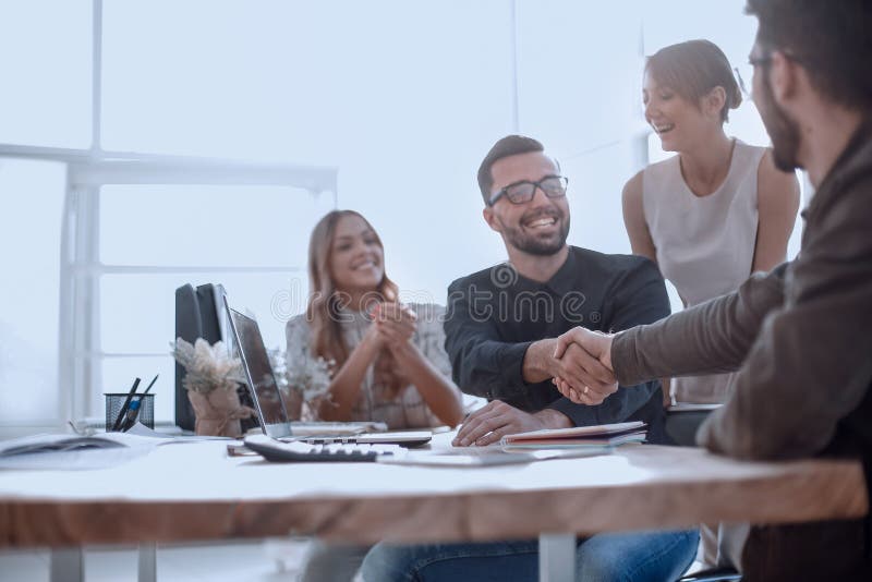 Background Image of the Handshake of Business Partners in the Office ...