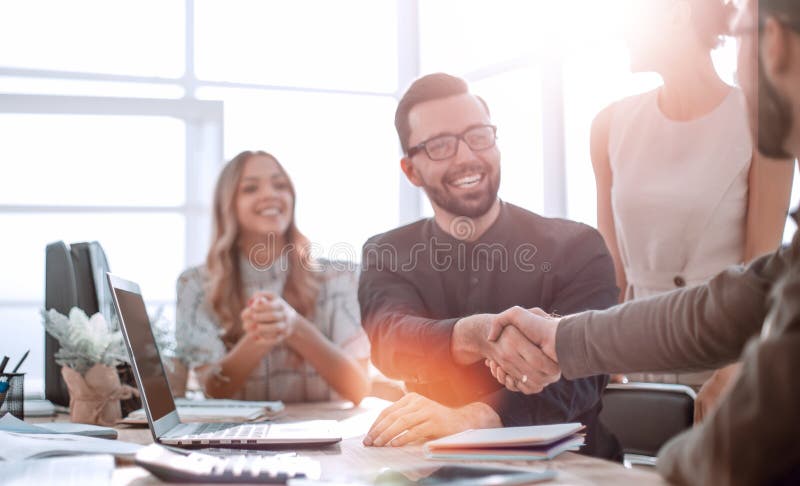 Background Image of the Handshake of Business Partners in the Office ...
