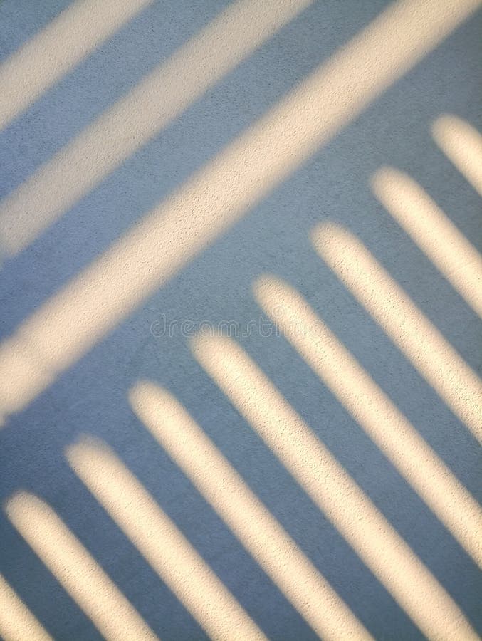 The Background Image of Light and Shadow Reflecting on the Wall Creates ...