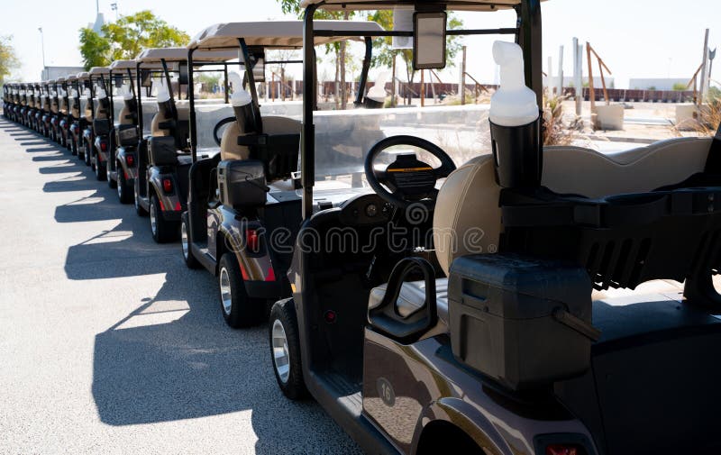 Background Image of Multiple Golf Carts Parked in Order Stock Image ...