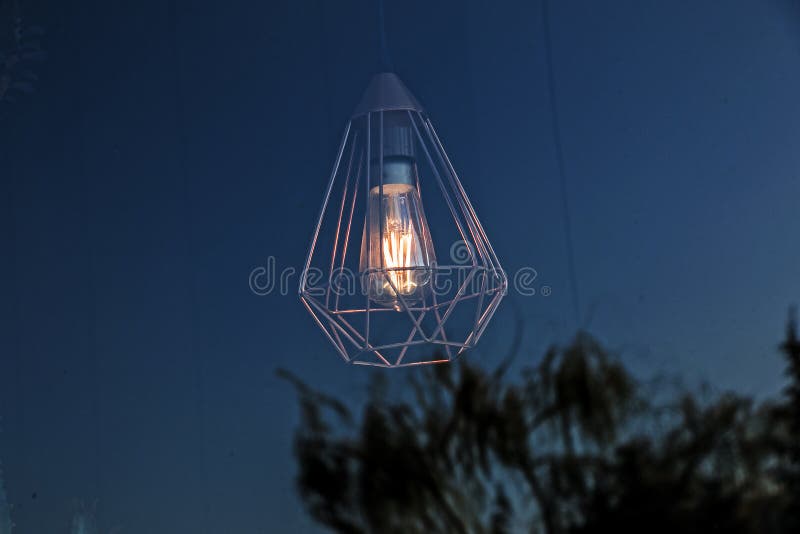 Background Image of an Outdoor Lamp, Focus on a Classic Light Bulb with ...