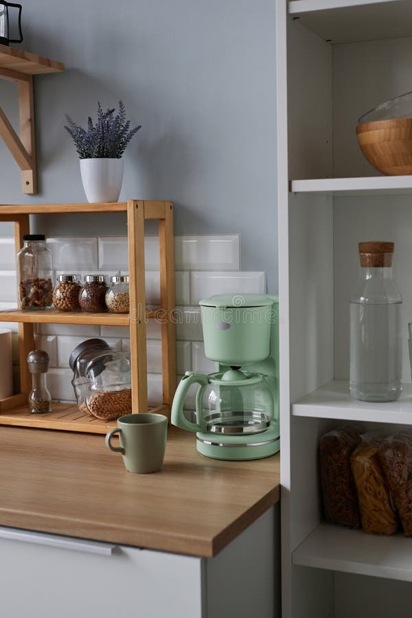 Pastel Colored Mini Coffee Machine on Kitchen Counter in Cozy Interior ...