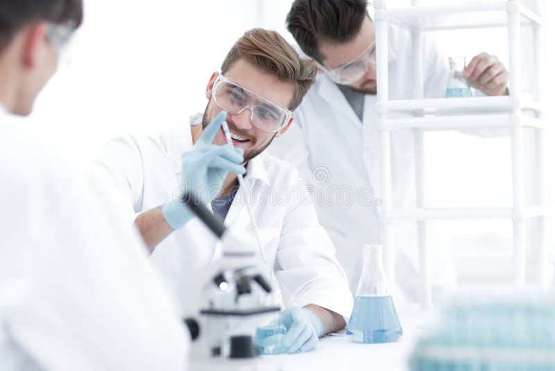 Background Image Science Team in the Lab Stock Image - Image of looking ...