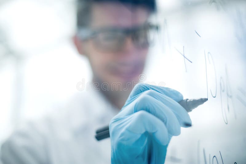Background Image.the Scientist Writes on a Glass Board Stock Photo ...