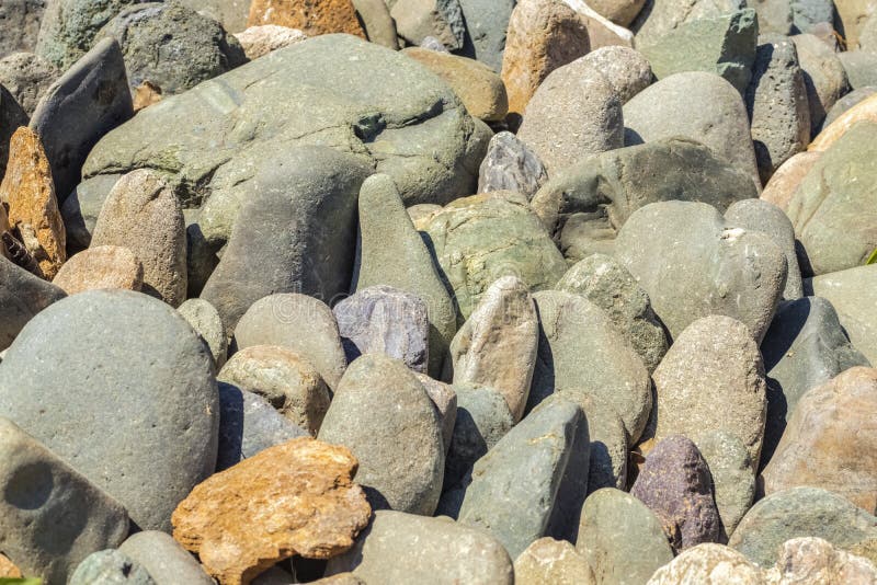 Background of Large Sea Rocks of Different Breeds. Background Stock ...