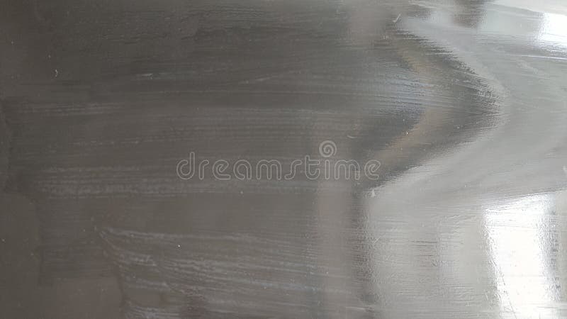 Background of Light Stripes of Water Reflecting on Black Matte Wet ...