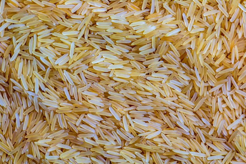 Background of Long Grain Parboiled Uncooked Rice. Rice Groats As ...