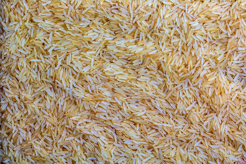 Background of Long Grain Parboiled Uncooked Rice. Rice Groats As ...