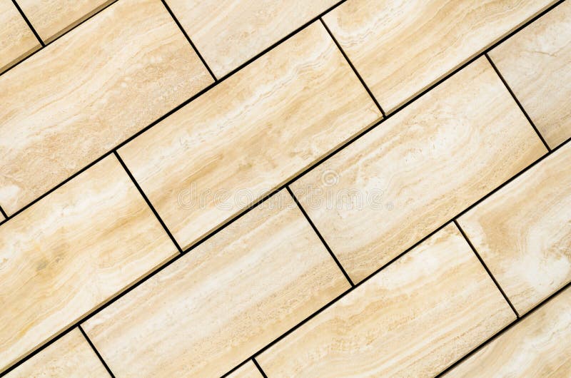 The Background is Made with Beige Tiles Placed Diagonally Stock Image ...