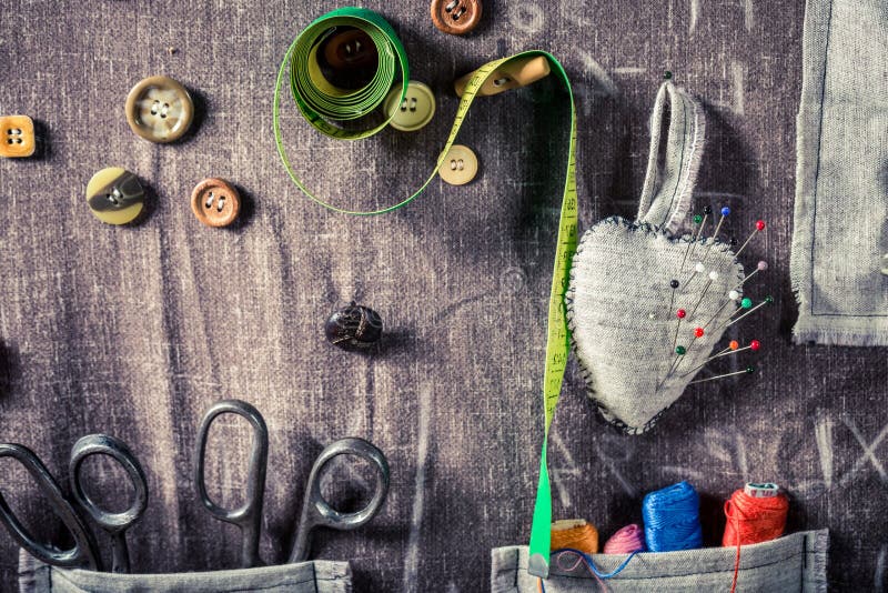 Background Made of Needles, Threads and Buttons in Tailor Workshop ...
