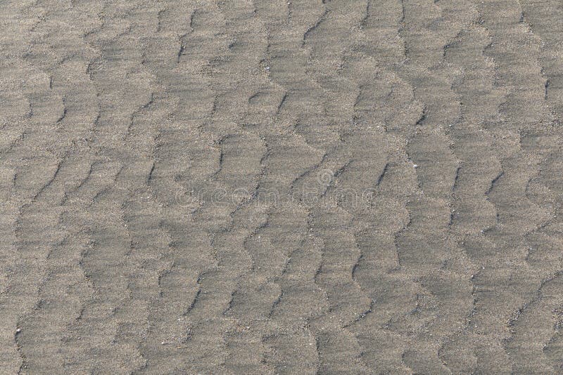 Background Made Off Beach Sand with Structure Made by Waves Stock Photo ...