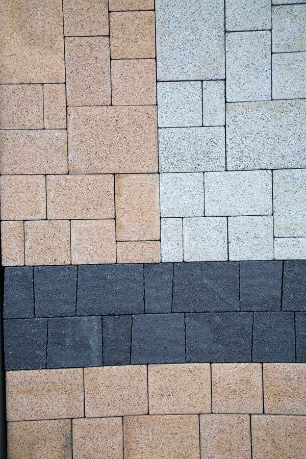 The Background is Made of Rectangular Paving Stones in Gray, Beige and ...
