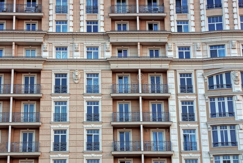 The Texture of the Multitude of Windows and Balconies on the Brown Wall ...