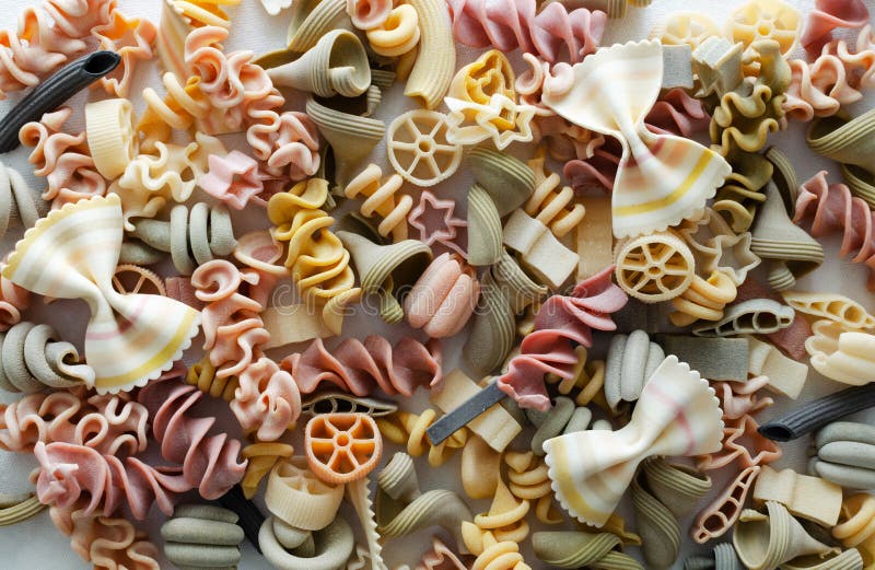 Background Mix of Multi-colored Italian Pasta on a Light Background ...