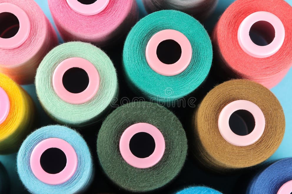 Background of Multi-colored Bobbins with Thread, Accessories for Sewing ...