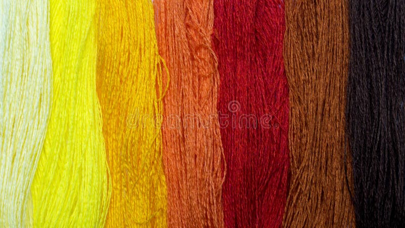Background from Multi-colored Threads. Rainbow Thread in Red Tones ...