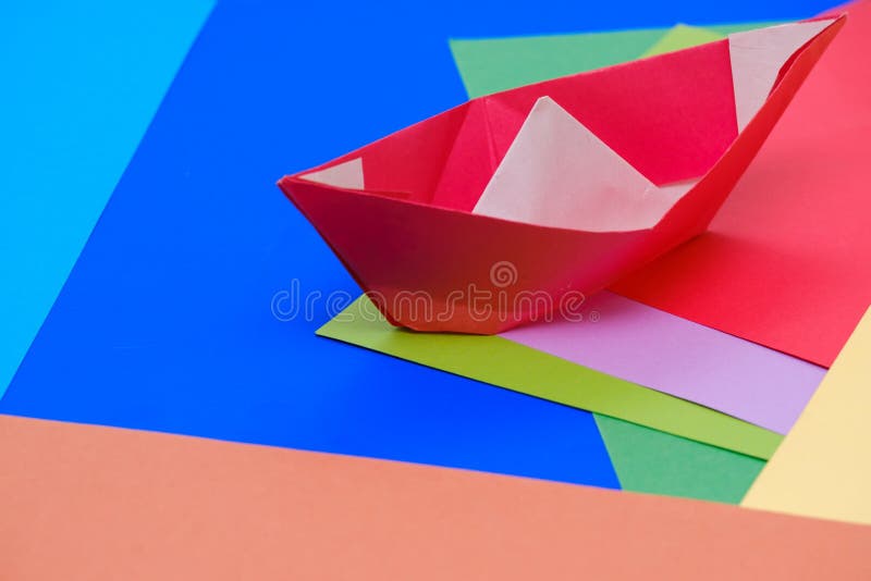 Background of Multicolored Colored Paper and Paper Boat from Top View ...