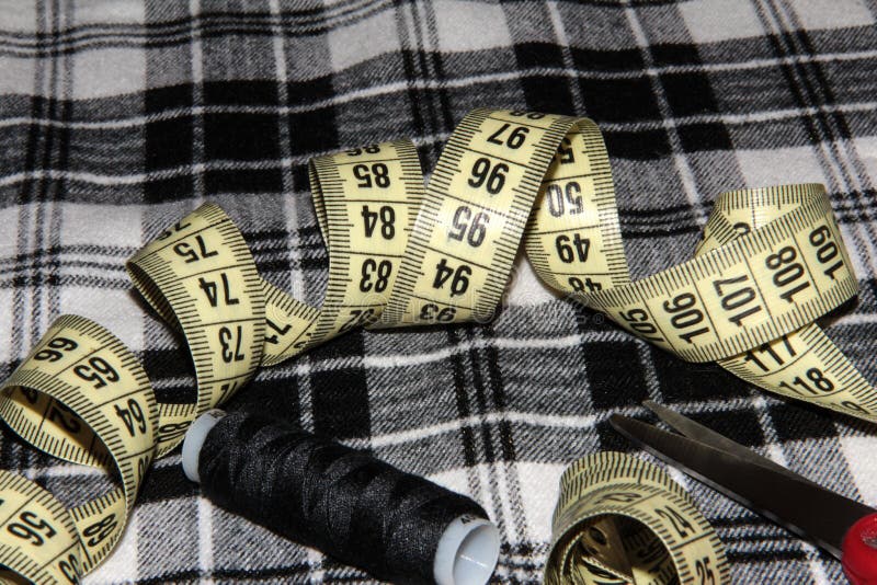 Background for Needlework. on the Checkered Fabric Scissors with ...