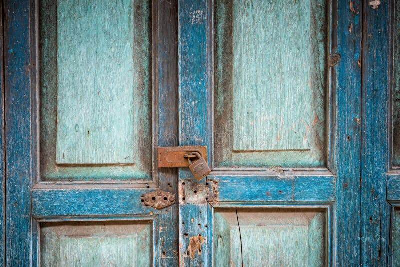 Blue Wooden Doors with Rough Texture Locked by Rusty Key Lock Stock ...