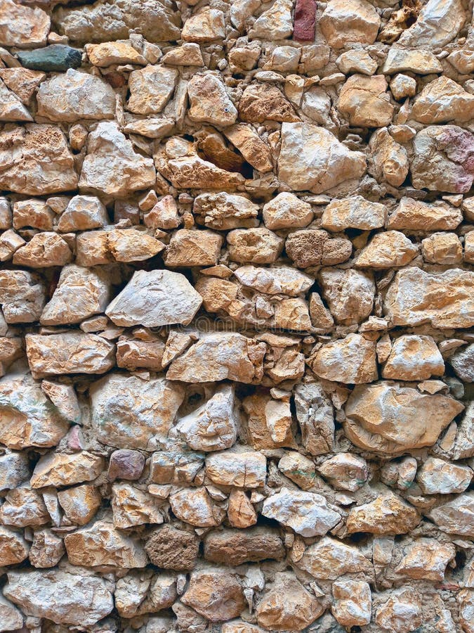 Background of Old Wall of Stone and Mud. Rustic Stone Facade ...