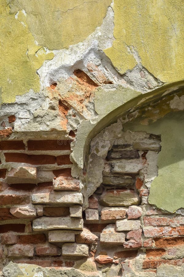 Background of Old Yellow Brick Wall with Collapsed Plaster. Texture of ...