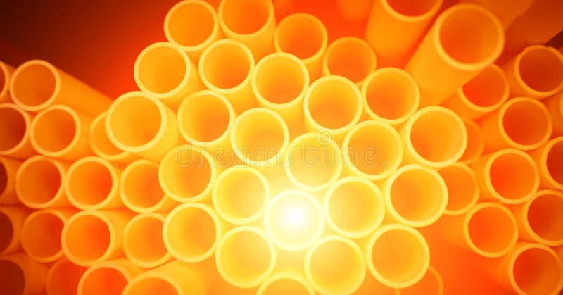 Background of the Orange Plastic Pipes in Stacked Stock Image - Image ...