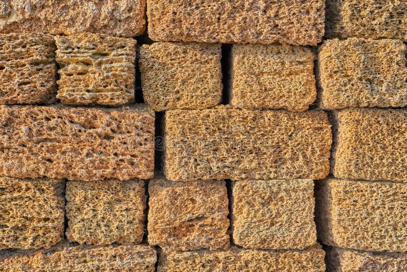 Background of Orange Porous Volcanic Bricks. Stock Photo - Image of ...