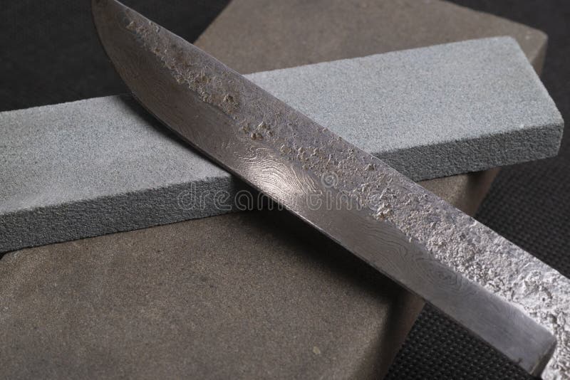 Background with a Pattern of Damascus Steel. Macro Shot of Damascus ...