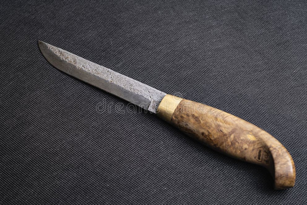 Background with a Pattern of Damascus Steel. Macro Shot of Damascus ...