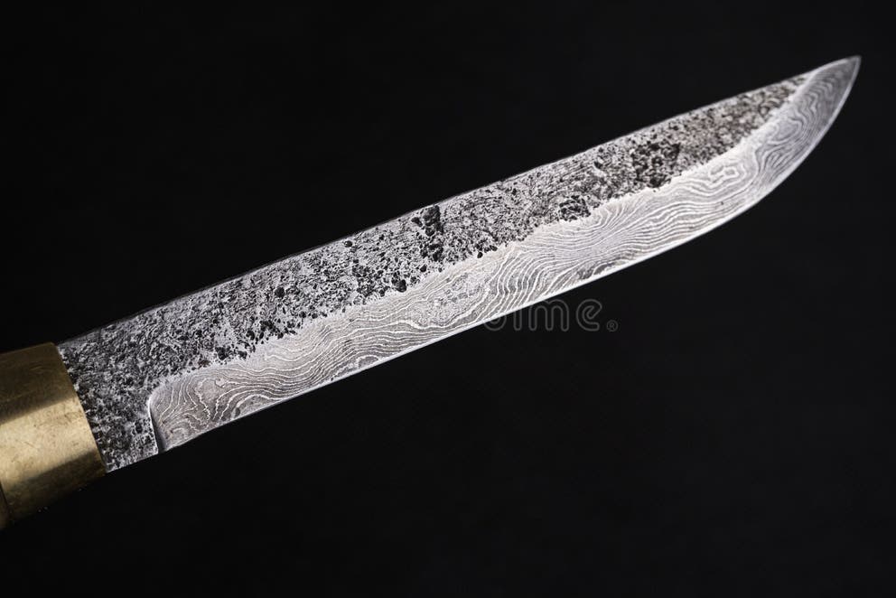 Background with a Pattern of Damascus Steel. Macro Shot of Damascus ...