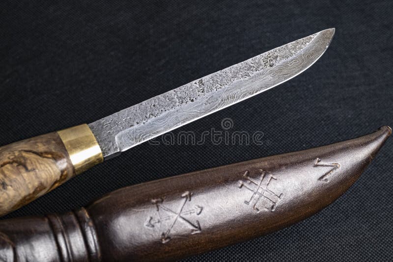 Background with a Pattern of Damascus Steel. Macro Shot of Damascus ...