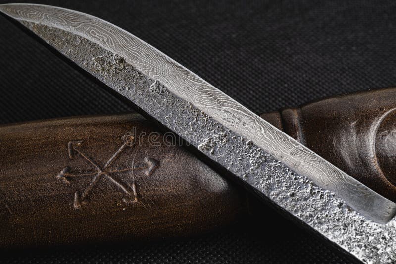 Background with a Pattern of Damascus Steel. Macro Shot of Damascus ...