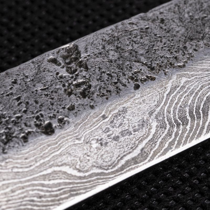 Background with a Pattern of Damascus Steel. Macro Shot of Damascus ...