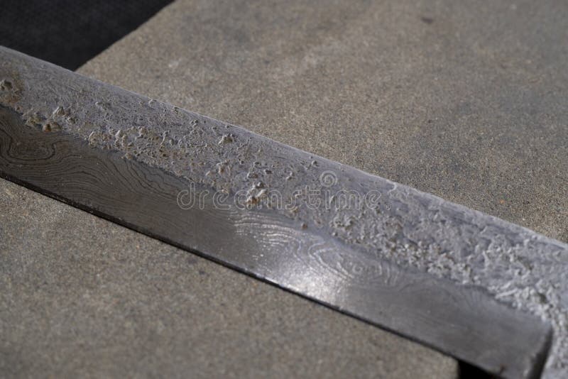 Background with a Pattern of Damascus Steel. Macro Shot of Damascus ...