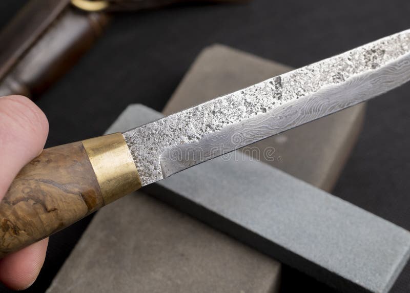 Background with a Pattern of Damascus Steel. Macro Shot of Damascus ...