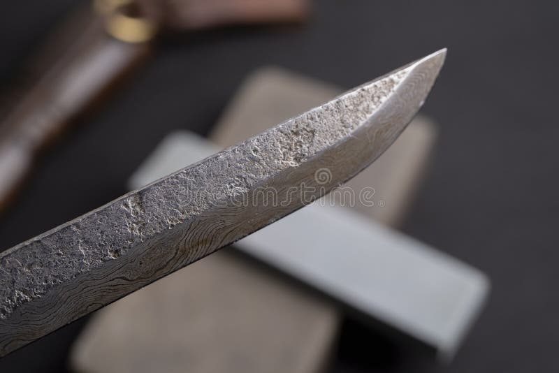 Background with a Pattern of Damascus Steel. Macro Shot of Damascus ...