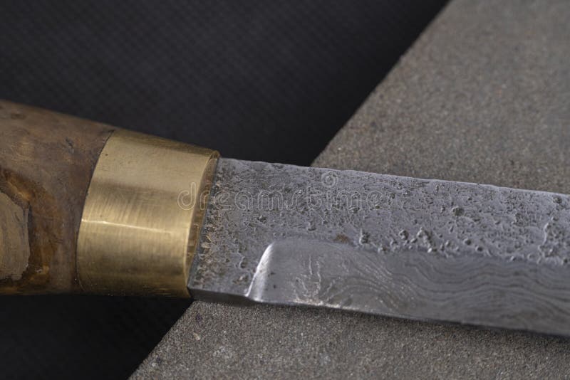 Background with a Pattern of Damascus Steel. Macro Shot of Damascus ...