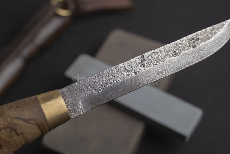 Background with a Pattern of Damascus Steel. Macro Shot of Damascus ...