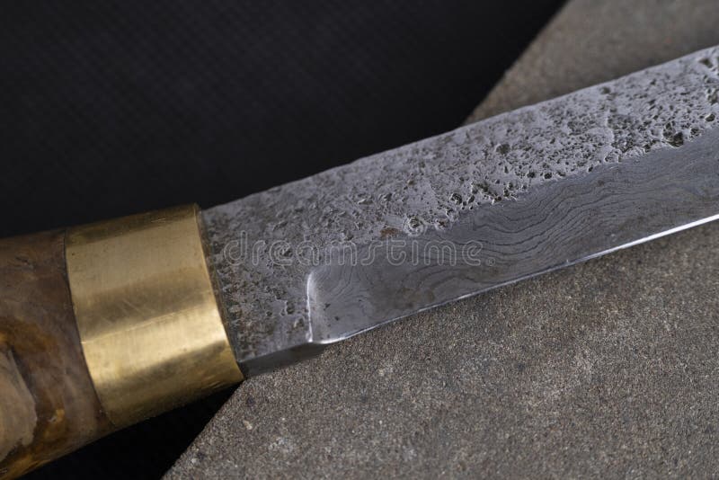 Background with a Pattern of Damascus Steel. Macro Shot of Damascus ...