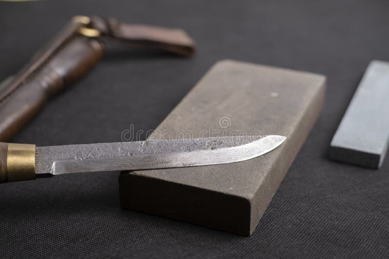 Background with a Pattern of Damascus Steel. Macro Shot of Damascus ...